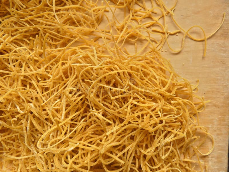 Pasta on Pastry Board stock image. Image of noodle, eating - 101962437