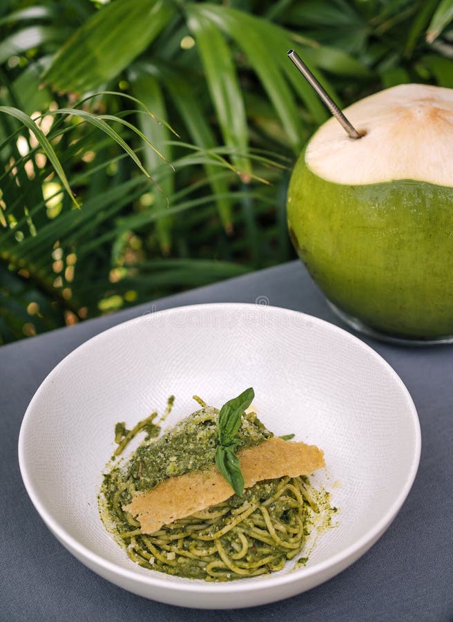 Pasta Pesto and Coconut on the Table Stock Photo - Image of table ...
