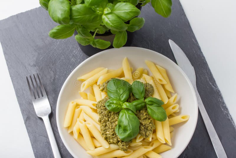 Pasta with Pesto in a Plate on a Table Stock Image - Image of cook ...