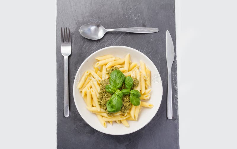 Pasta with Pesto in a Plate on a Table Stock Image - Image of parmesan ...
