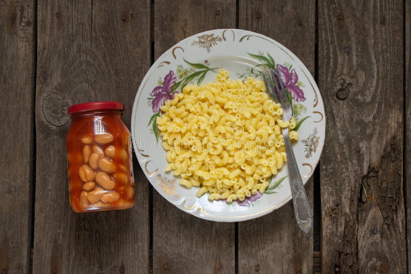 Pasta in a Plate on a Table for Lunch and Beans Poor Man Breakfast ...