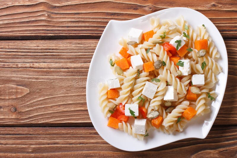 Pasta with Pumpkin and Feta on a White Plate. Top View Stock Image ...