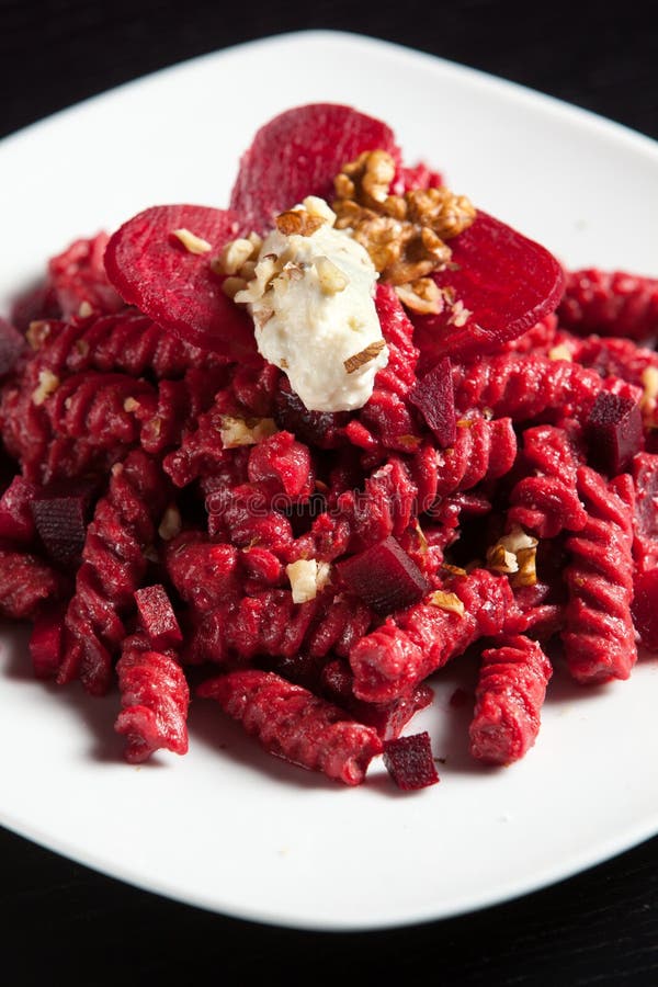 Pasta with Red Beets Cheese and Walnuts Stock Photo - Image of ...