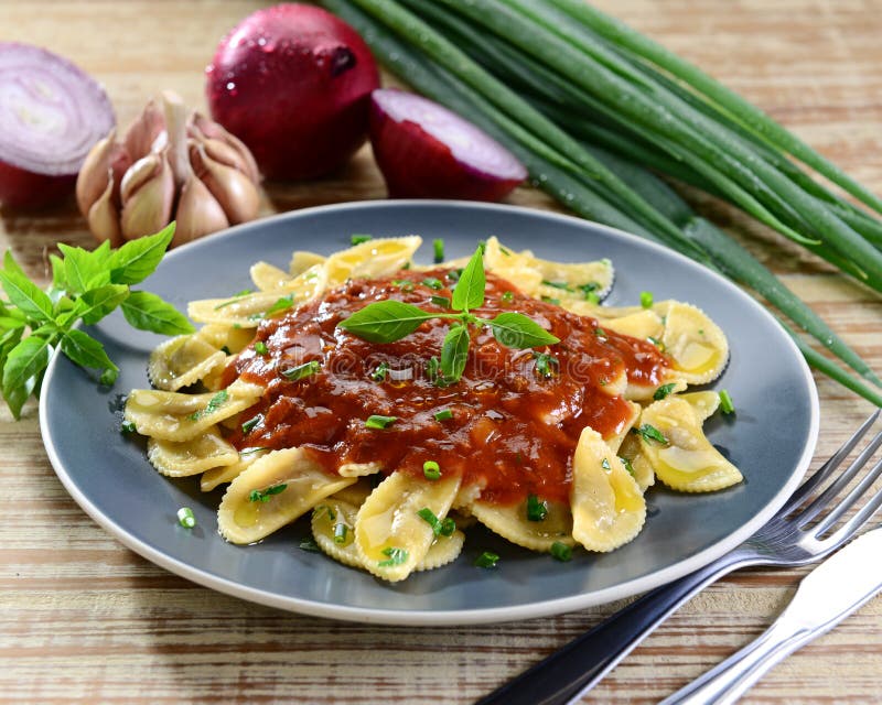Pasta on red sauce stock photo. Image of green, cheese - 42302154