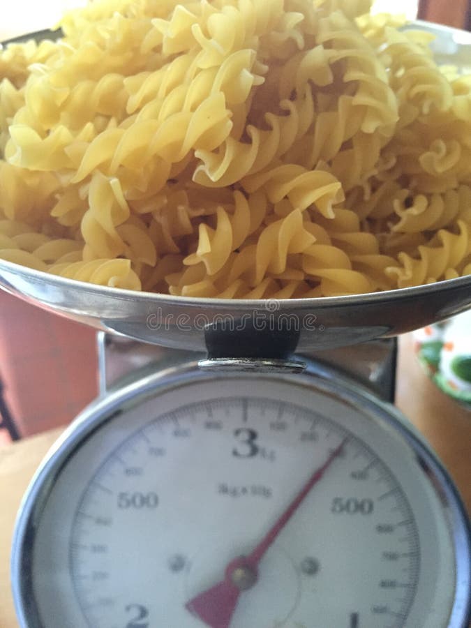 Pasta on scale stock photo. Image of weight, duram, closeup - 57270696