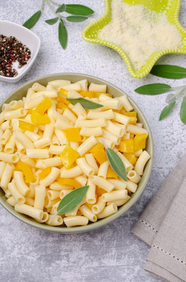Pasta with Slices of Yellow Pepper Stock Photo - Image of food, bowl ...