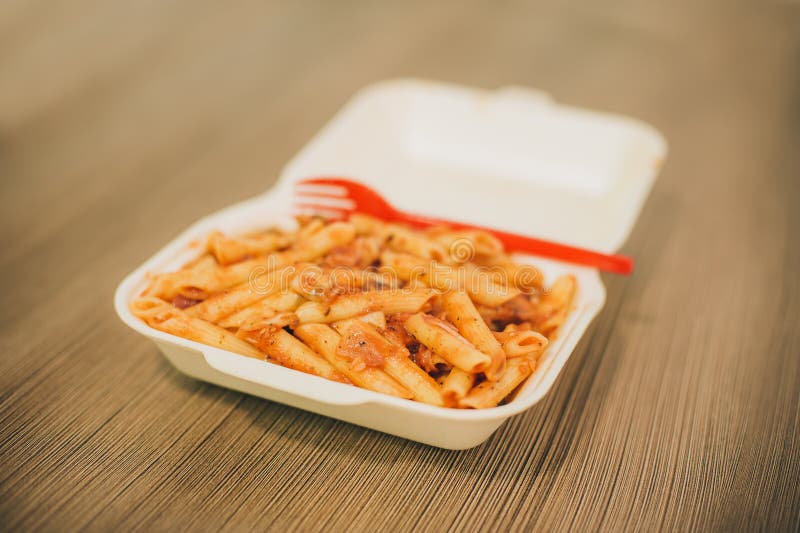 Pasta and Spaghetti in Delivery Package with Plastic Fork Stock Image ...