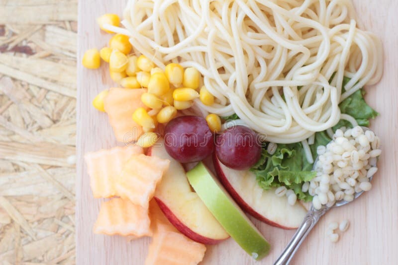 Pasta Spaghetti with Salad Mix Fruit. Stock Photo - Image of cooked ...