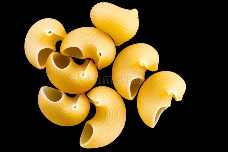 Pasta, Spaghetti, Shells, Rings, Bows on a Black or White Background ...