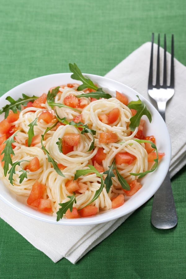 Pasta with Tomato and Rucola Stock Photo - Image of mediterranean ...