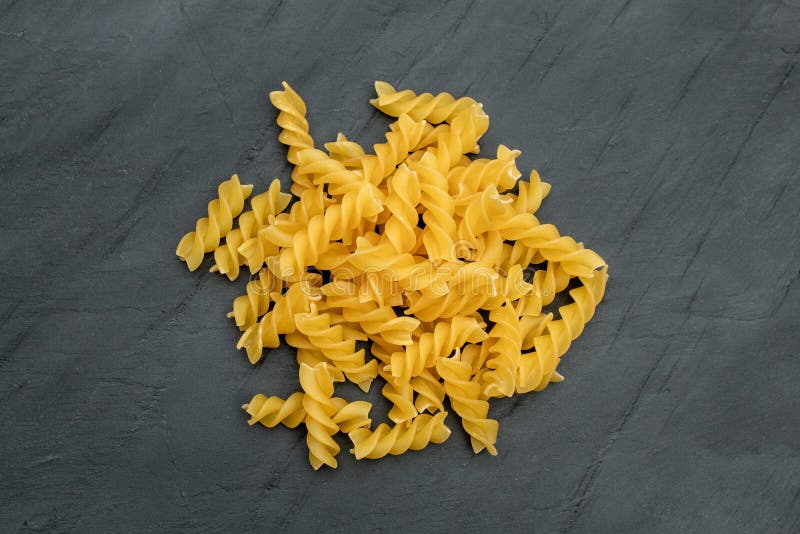 Pasta Twirls, Whole Wheat Spaghetti and Brown Rice on a Wooden Table ...