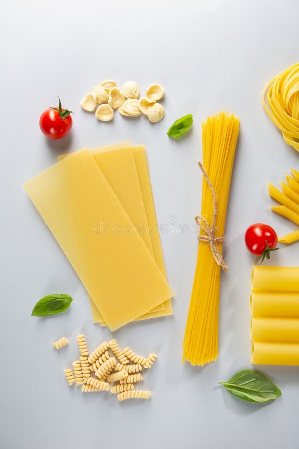 Pasta Types Overhead View on Light Surface Stock Photo - Image of ...