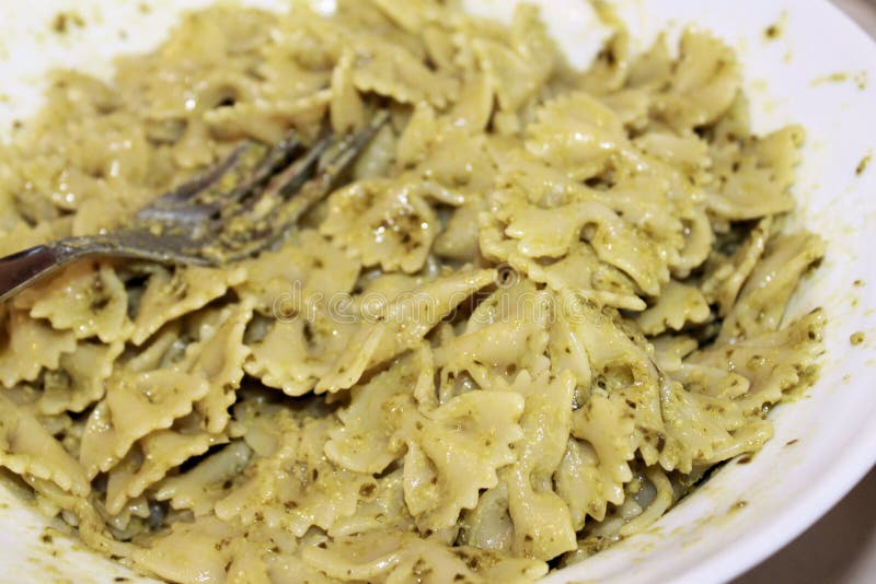 Pasta stock image. Image of topped, plate, sauce, pesto - 53554921