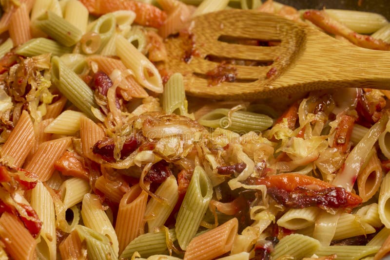 Pasta with Vegetables in a Pan while they are Cooked Stock Photo ...