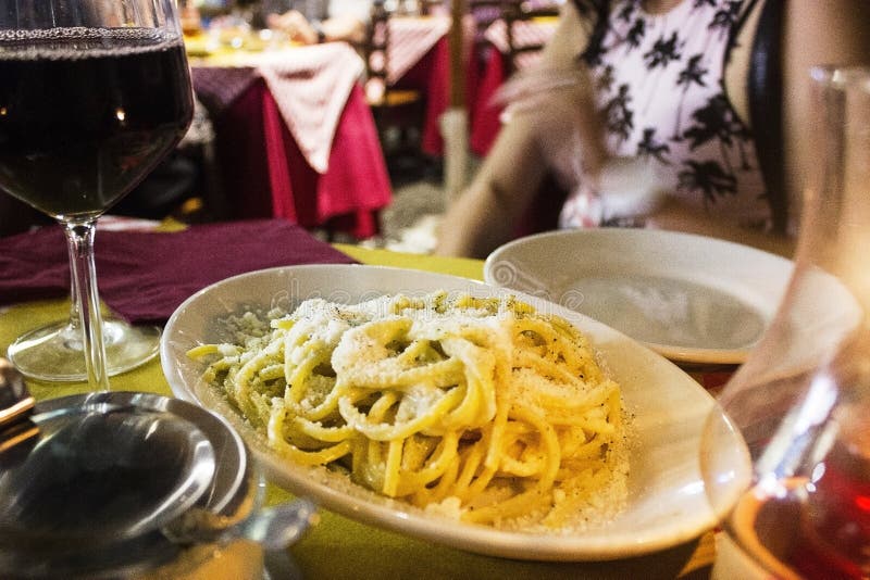 Pasta and wine on a table stock image. Image of cooked - 93142375