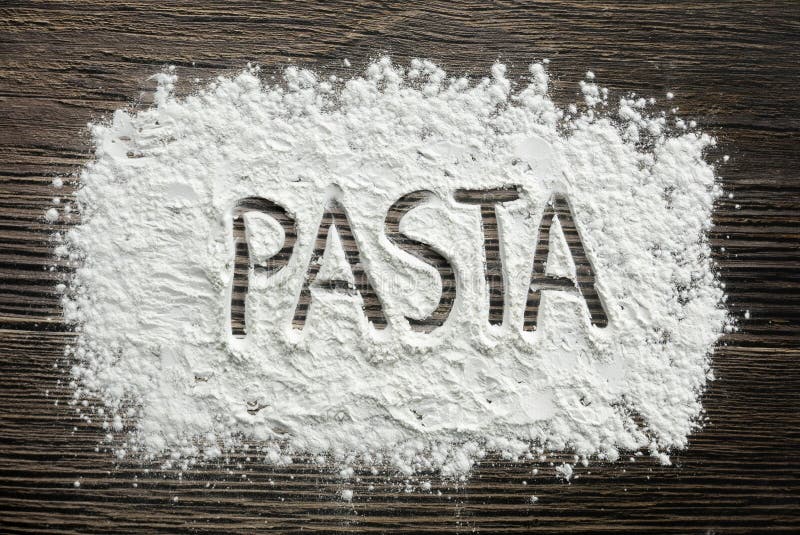 Pasta Written on a Sprinkled Flour Powder on the Table Stock Image ...