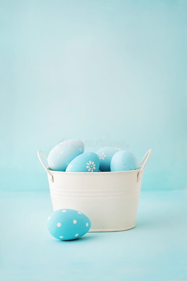 Pastel Blue Easter Eggs in Basket on Blue Background Stock Photo ...