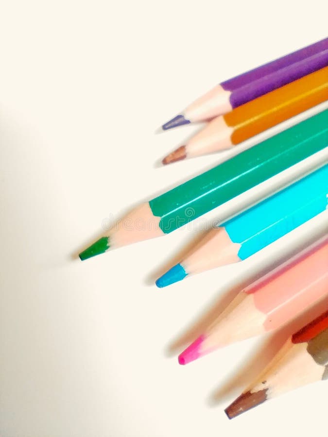 Pastel Colored Pencils Pointing Towards the Center of the Image from ...