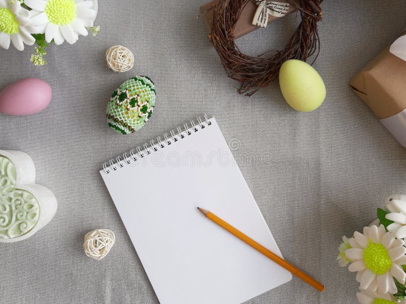 Pastel Colors and Decorated Easter Eggs, Wreath and Blank Notebook with ...