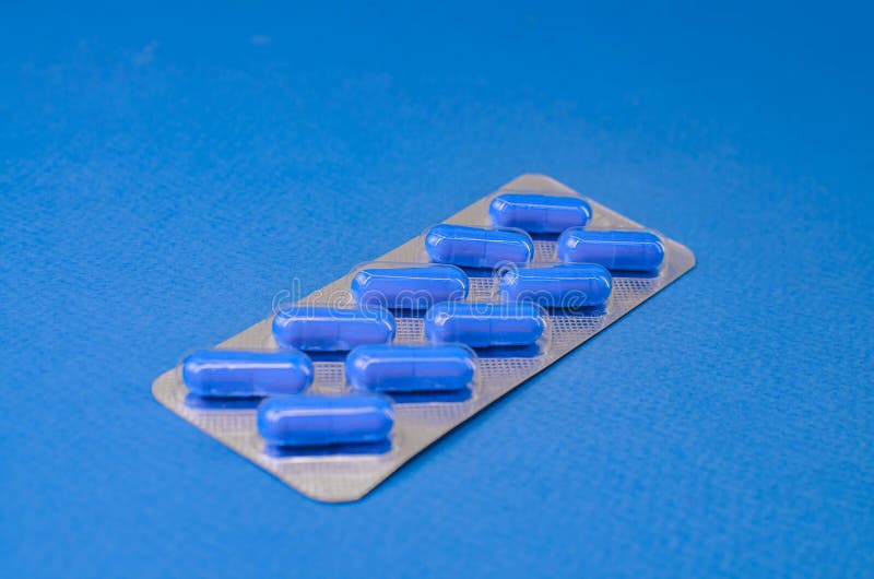 Pastillas Azules De Fondo Azul Foto de archivo - Imagen de cure ...