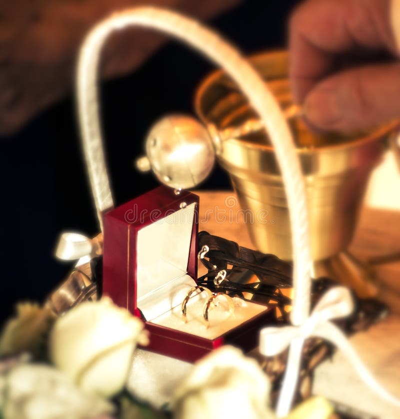 Pastor Blessing the Golden Wedding Rings in the Ring Box Stock Image ...