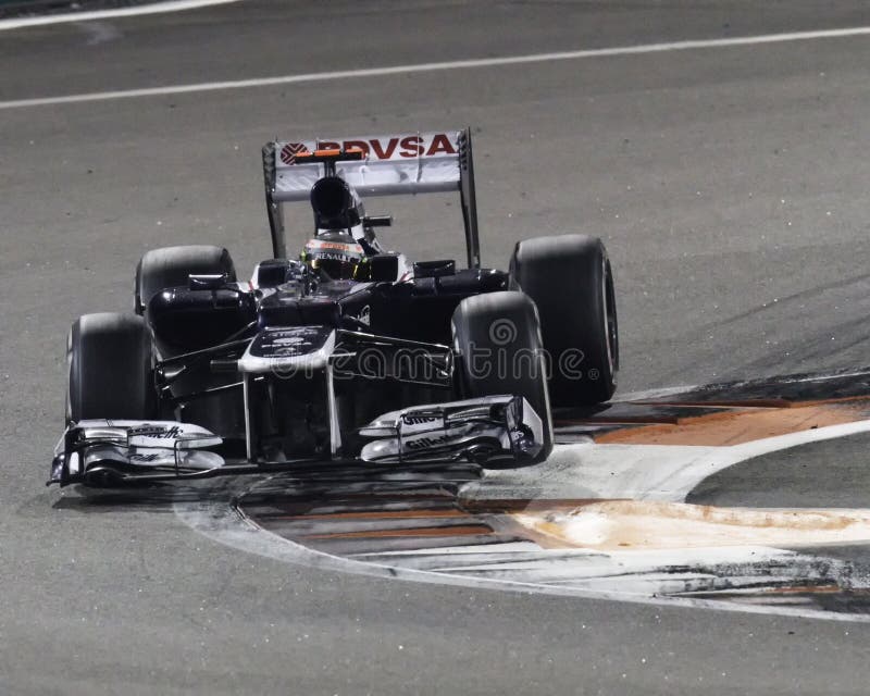 Fernando Alonso Cornering a Ferrari F1 Car at Yas Marina Race Track Abu ...