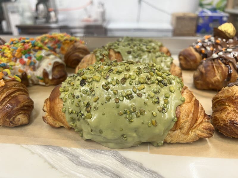 Iced pastries in case stock image. Image of bakery, coffee - 231186771