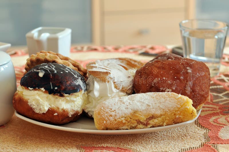Pastries on a plate stock photo. Image of assortment, delicious - 5496574