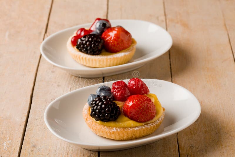 Pastry with Berries on Wooden Table Stock Image - Image of strawberries ...