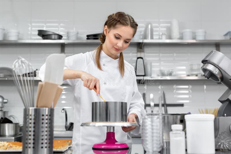 Pastry Chef Aligns the Cream with a Spatula Stock Photo - Image of ...