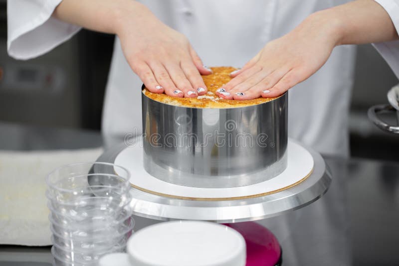 Pastry Chef Cuts a Biscuit To Assemble the Cake Stock Photo - Image of ...