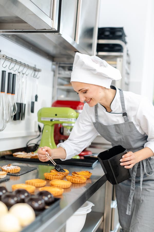 Pastry Chef Glazing Little Cakes Stock Photo - Image of bakery, person ...