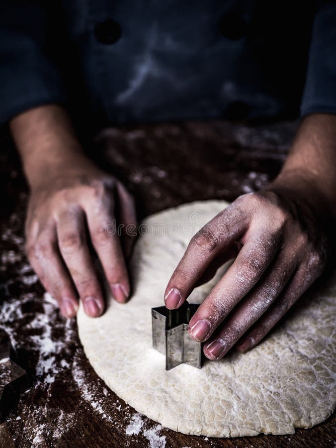 Pastry Chef Hand Use Cutting Mold To Cut Cookie Dough on Kitchen Stock ...