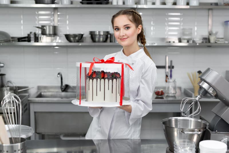 Pastry Chef is Holding a Cake in a Package Stock Image - Image of gift ...
