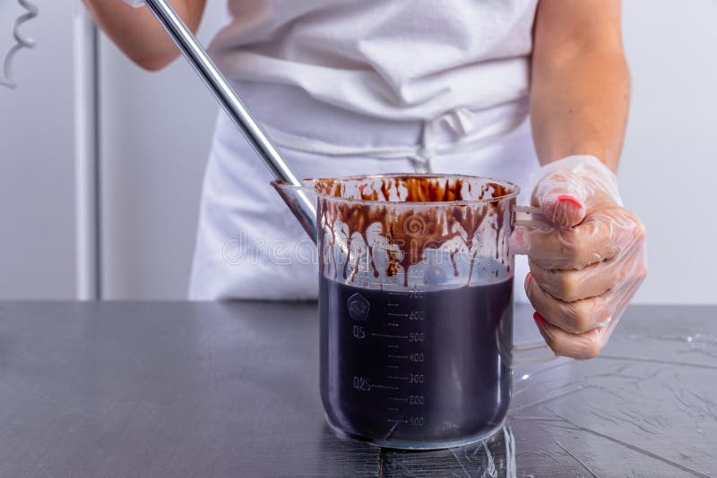 The Pastry Chef in the Kitchen Glazes Pastries. Cook Makes Chocolate ...