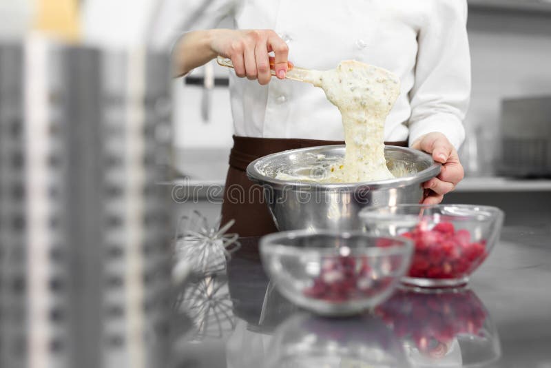 Pastry Chef Kneads the Dough for Making a Cake. Stock Image - Image of ...