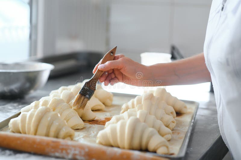 Pastry Chef Making Some Croissant in the Bakery Stock Photo - Image of ...