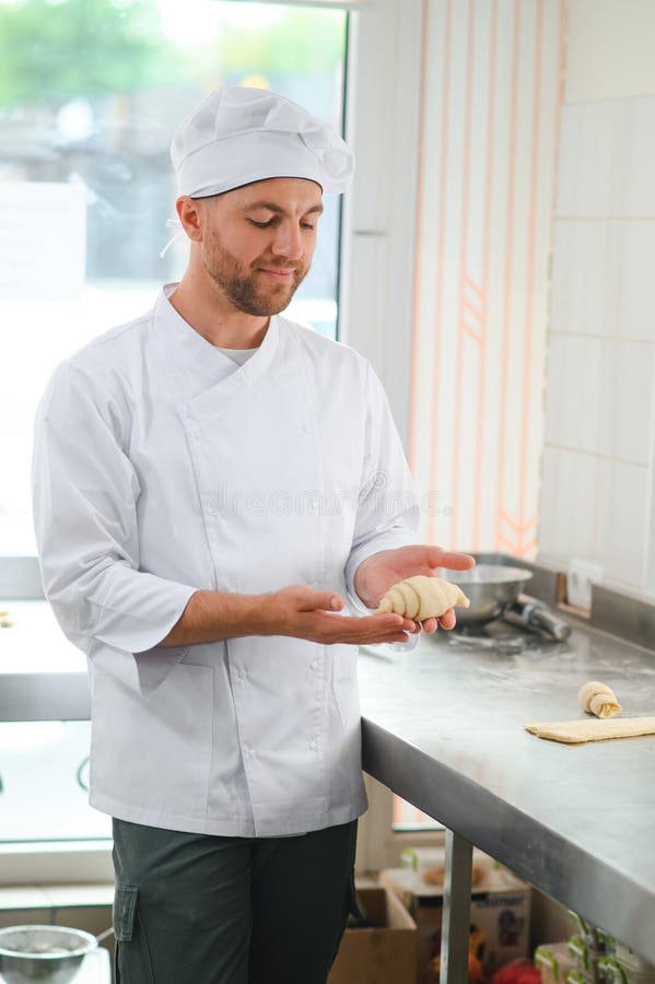 Pastry Chef Making Some Croissant in the Bakery Stock Photo - Image of ...