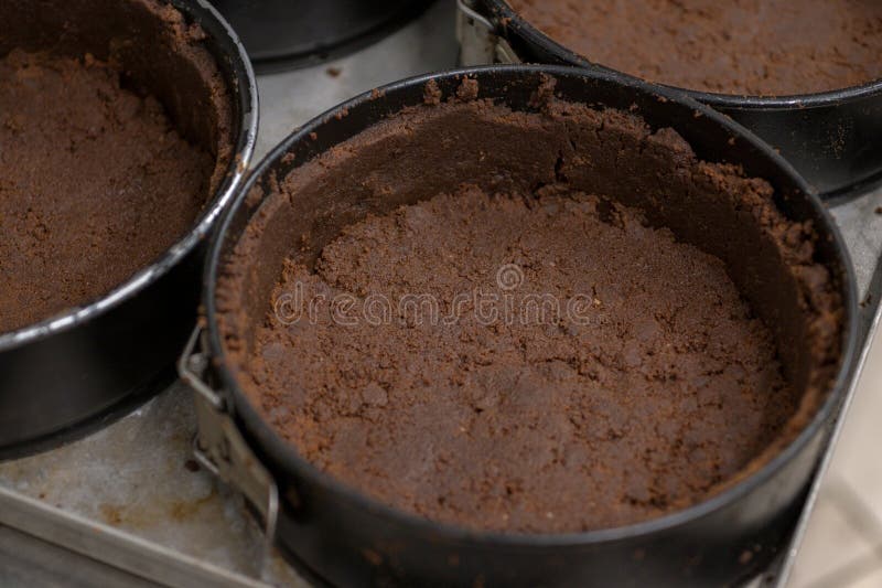 Pastry Chef Preparing and Baking Stack of Chocolate Crust for Salty ...
