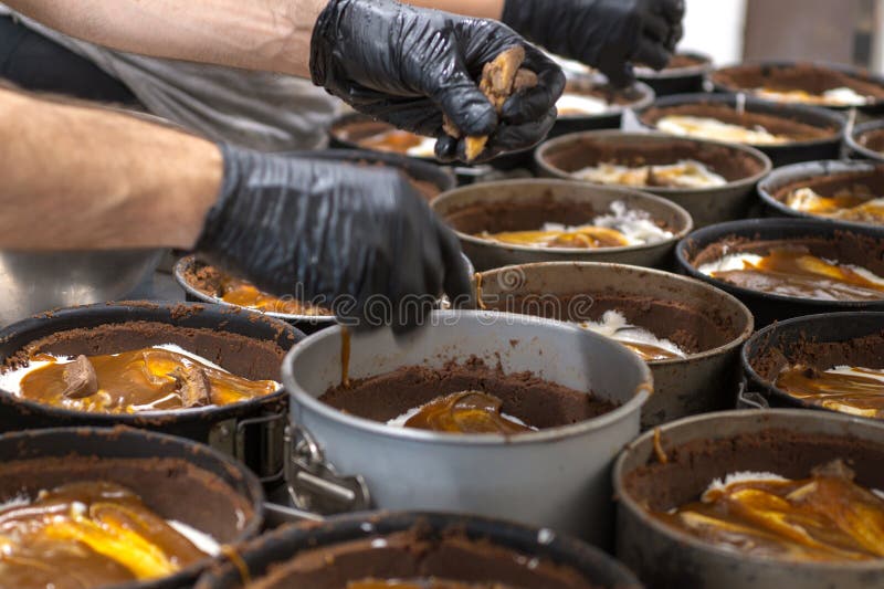 Pastry Chef Preparing and Baking Stack of Chocolate Crust for Salty ...