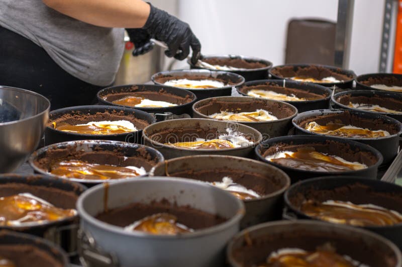 Pastry Chef Preparing and Baking Stack of Chocolate Crust for Salty ...