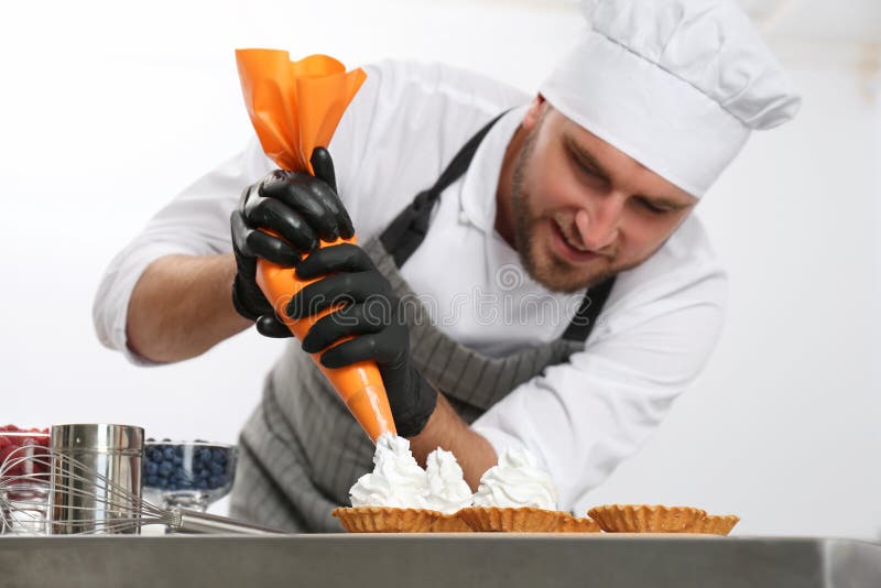 Pastry Chef Preparing Desserts at Table Stock Photo - Image of adult ...