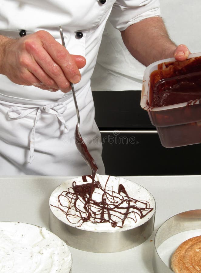 Pastry Chef Preparing Vanila Chocolate Cake. Stock Image - Image of ...