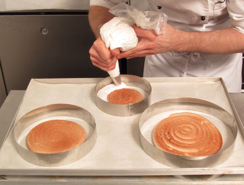 Pastry Chef Preparing Vanilla Cream Cakes. Stock Photo - Image of ...