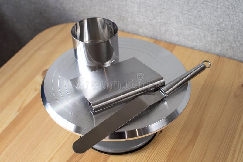 Pastry Chef S Tools Lie on a Rotating Table. Spatula, Spatula and Cake ...
