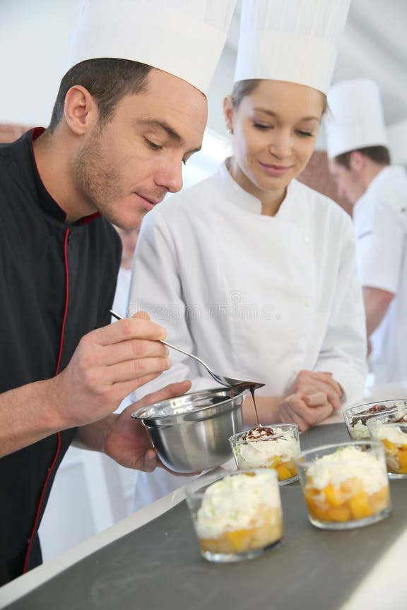Pastry Chef with Students Making Desert Stock Photo - Image of ...
