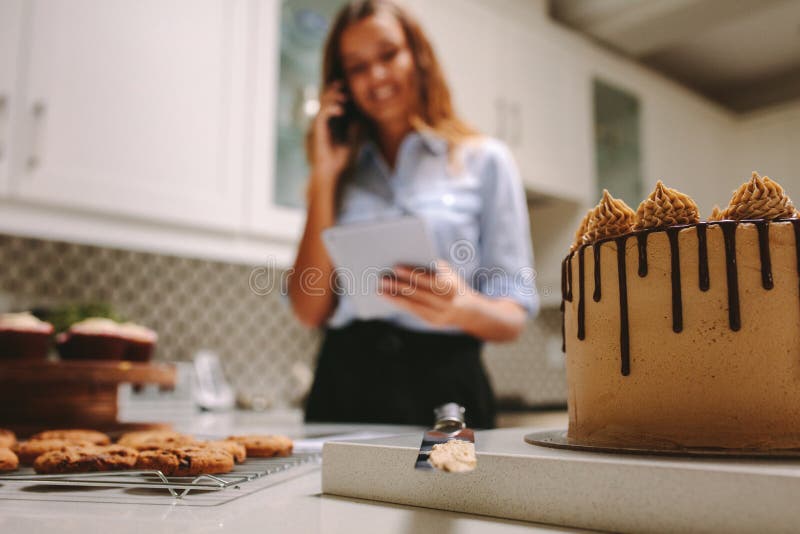 Pastry Chef Taking Orders on Phone Stock Photo - Image of business ...