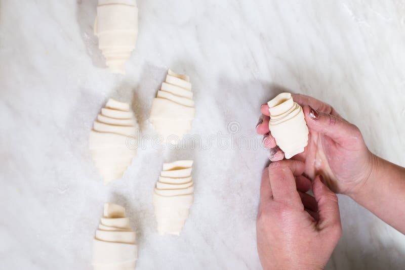 Pastry Chef Work. Hands Making Croissants. Raw Croissants on a White ...