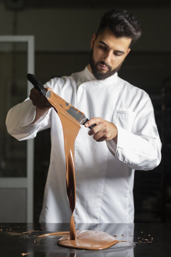 Pastry Chef Working on Tempering Chocolate on Marble Table Stock Photo ...