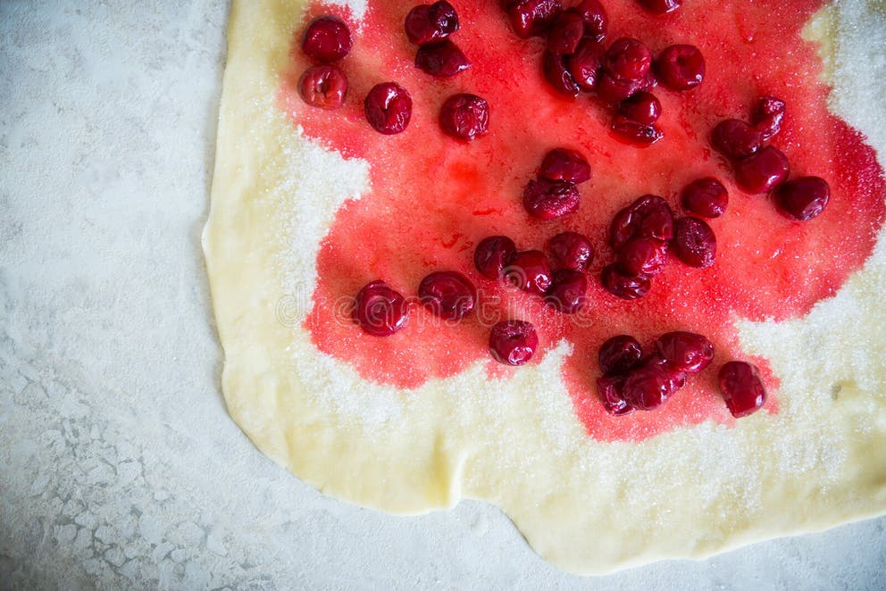 Pastry with Cherry Rolling on the Table Stock Image - Image of rolling ...
